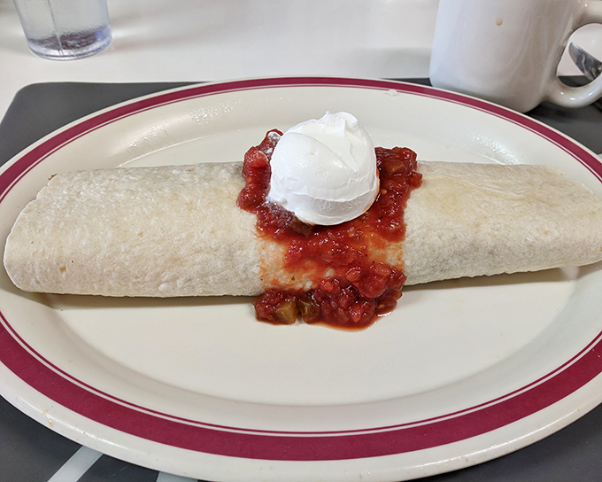 This breakfast burrito isn't just a meal—it's a commitment. The kind of portable feast that requires both hands and several napkins.