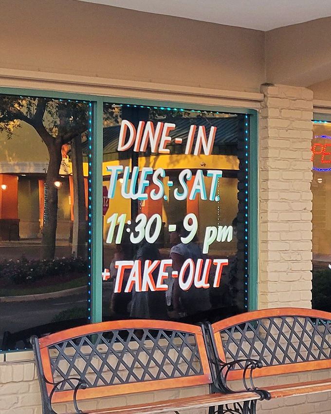 Operating hours posted clearly – because when you're serving food this good, people need to know exactly when they can get their fix.