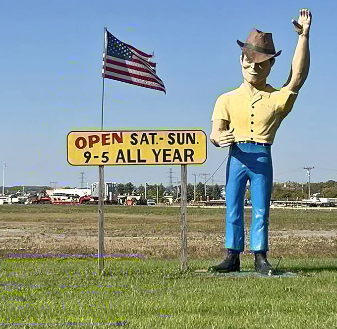 The friendly giant cowboy stands eternal watch, waving hello while reminding you of weekend hours—Ohio's own retail Paul Bunyan.