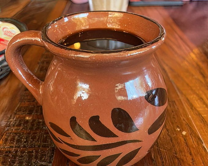 This isn't just coffee—it's liquid comfort in a traditional clay mug. The kind of brew that makes morning people out of night owls.