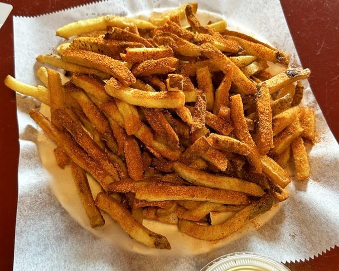 Cajun fries with attitude—crispy, seasoned soldiers that march straight from the fryer to your heart. Diet plans surrender at first bite.