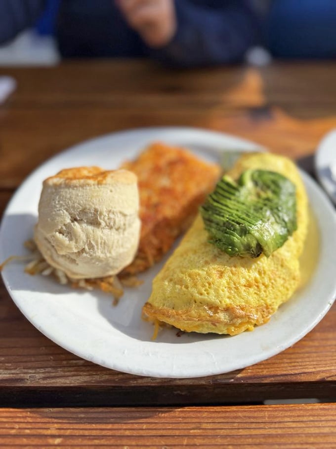 The perfect omelet is like finding the right life partner—it should be fluffy, supportive of avocado, and make you smile just looking at it.