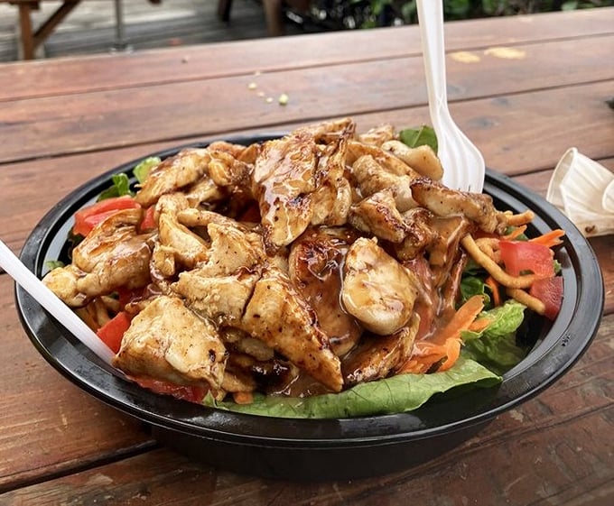 Even the salads mean business at Carney's. This isn't some sad afterthought for the diet-conscious—it's a legitimate flavor contender worthy of the yellow train car.