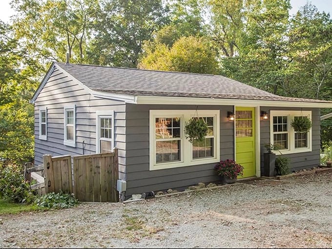 This picture-perfect cottage with its cheerful green door offers visitors a chance to live like a local in Clifton's storybook setting.