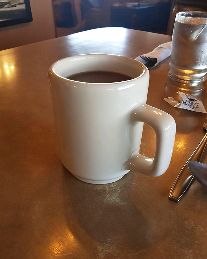 The humble diner coffee mug—unassuming yet mighty, ready to fuel desert adventures or just good conversation.