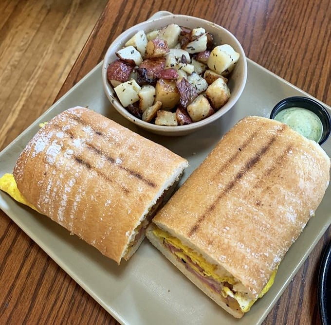 This sandwich doesn't just satisfy hunger—it resolves it completely, with crispy bread giving way to a perfect ratio of fillings and those potatoes!