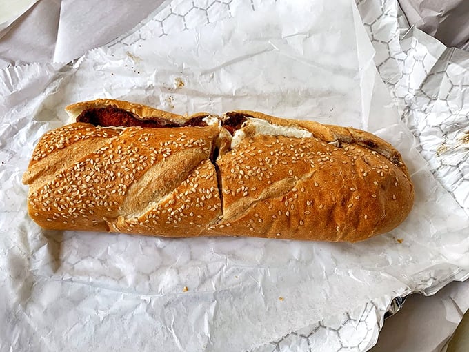 The seeded roll cradles its precious cargo like the sandwich royalty it is—simple, perfect, and utterly Philadelphia.