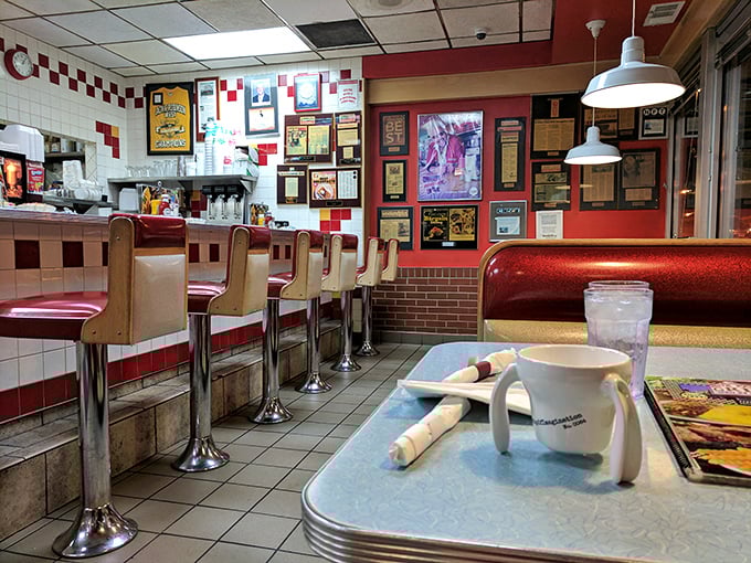 The counter seats – where regulars perch like birds on a wire, watching the morning unfold over steaming mugs of coffee.