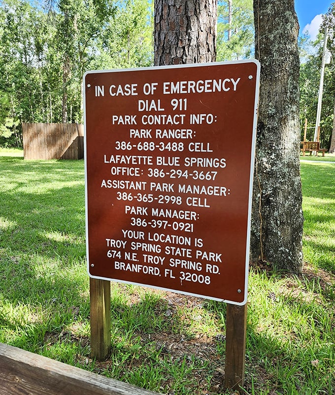 The emergency contact information – because even paradise needs a help desk. The ultimate "break glass in case of emergency" for wilderness adventurers.