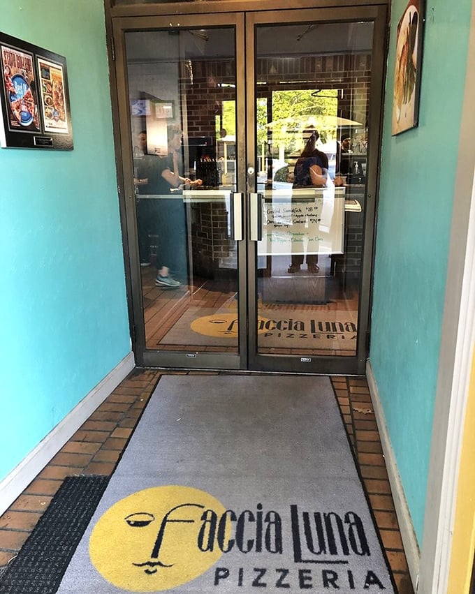 The entrance's distinctive moon-face logo welcomes you like an old friend – the first hint that you're about to have a meal worth remembering.