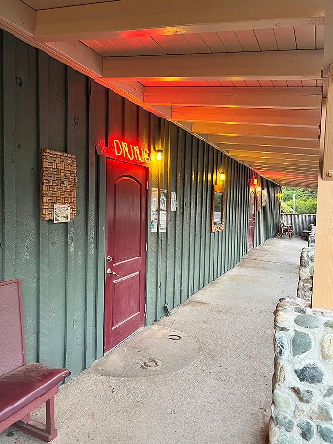 The entrance, with its weathered wood and stone accents, promises an authentic experience that Instagram filters couldn't improve upon.