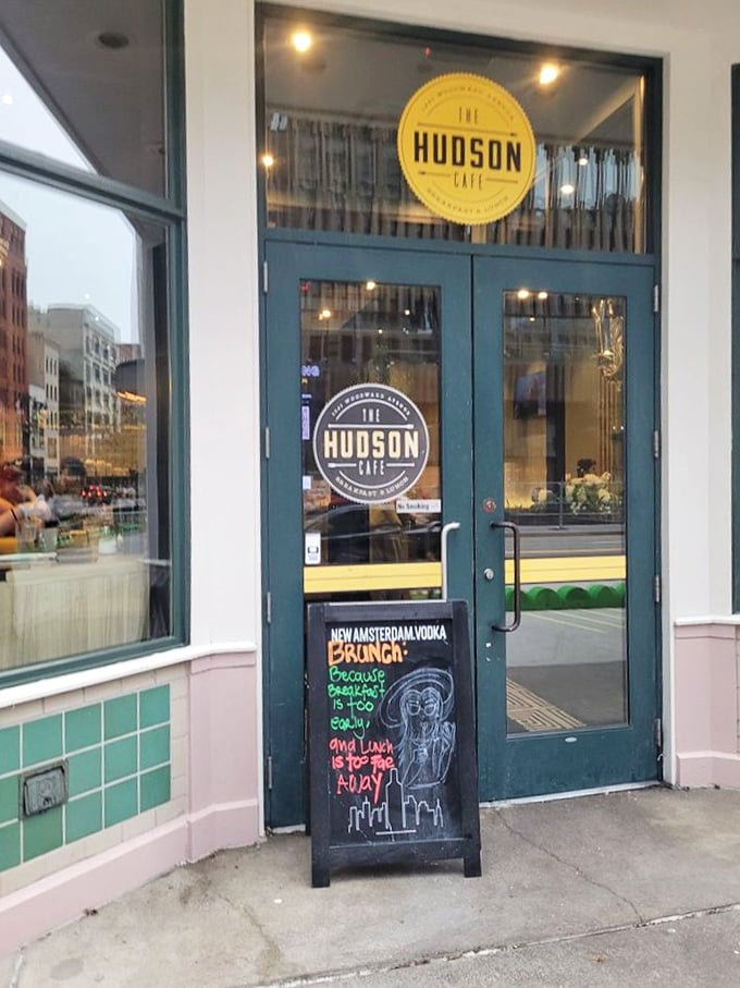 The welcoming entrance promises brunch adventures within—complete with a chalkboard sign that might as well say "Happiness Served Daily."