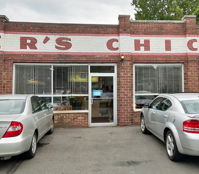 The entrance to Miller's Chicken isn't just a doorway—it's a portal to a world where fried chicken dreams come true and diet plans go to die.