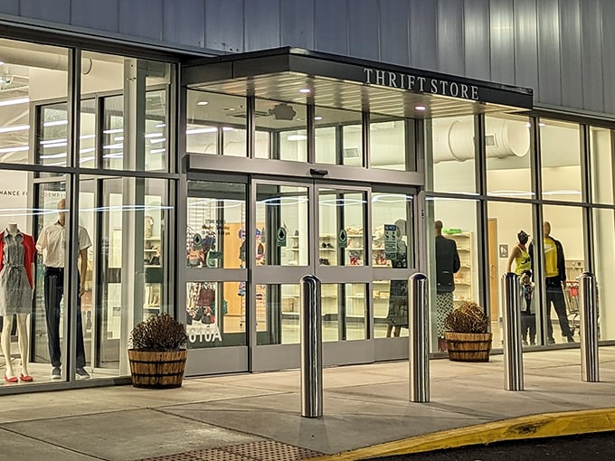 The illuminated entrance glows like a portal to possibility. Even at night, this thrift store promises adventures in secondhand style.