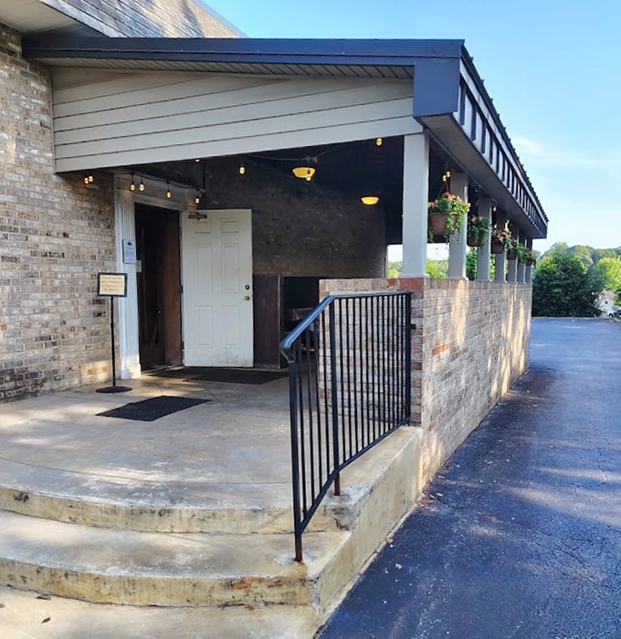 A few simple steps lead to culinary happiness – this entrance has welcomed generations of diners seeking the perfect steak.