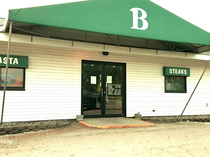 The entrance says it all – "Steaks" is literally on the sign. No false advertising here, just a green awning beckoning you toward beef nirvana.