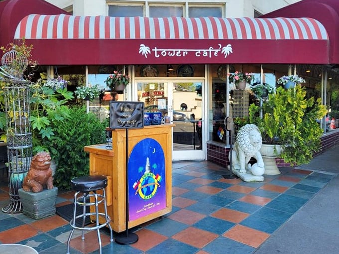 The welcoming entrance with its distinctive red awning and colorful planters signals you've arrived somewhere special—a Sacramento institution worth the wait.