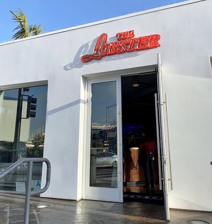 The entrance beckons like a portal to seafood nirvana. That iconic red script logo has welcomed generations of hungry ocean lovers.