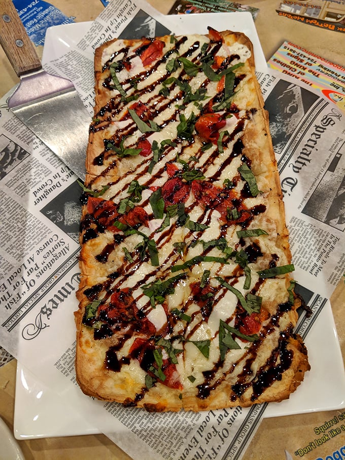 A flatbread that proves simple ingredients – when treated with respect and a little balsamic drizzle – can create pure magic.