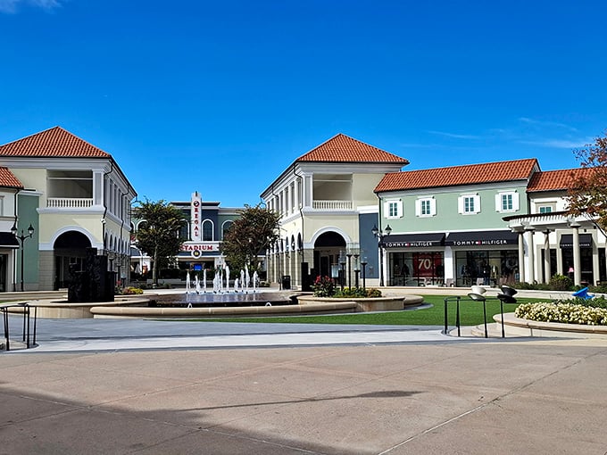 Mediterranean-inspired architecture and a central fountain create an upscale shopping atmosphere that belies the outlet prices.