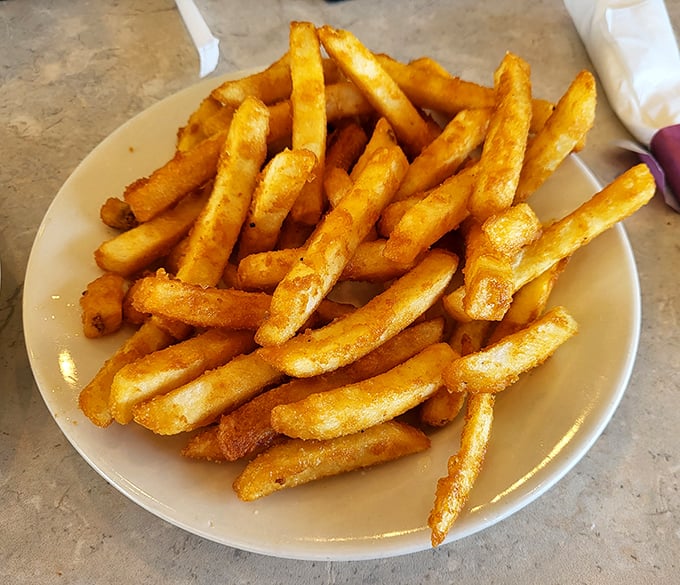 These aren't just french fries—they're golden happiness sticks with the perfect crisp-to-fluffy ratio that makes sharing an act of true generosity.