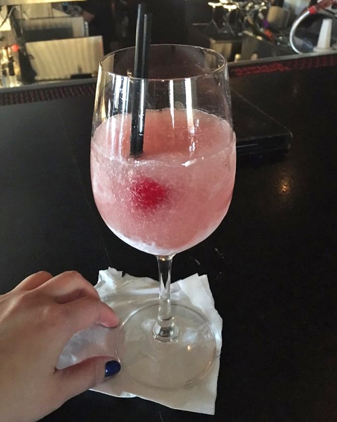 A frosé that captures summer in a glass. That pink hue isn't just pretty—it's the color of afternoons with nowhere to be but here.