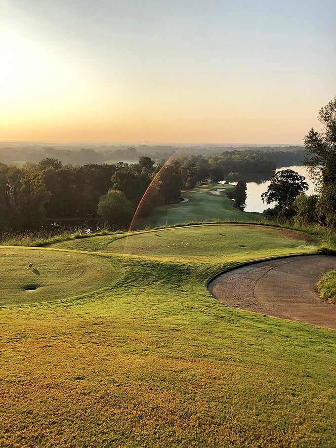 The Robert Trent Jones Golf Trail offers breathtaking views at sunrise, where morning mist rises from perfectly manicured greens.