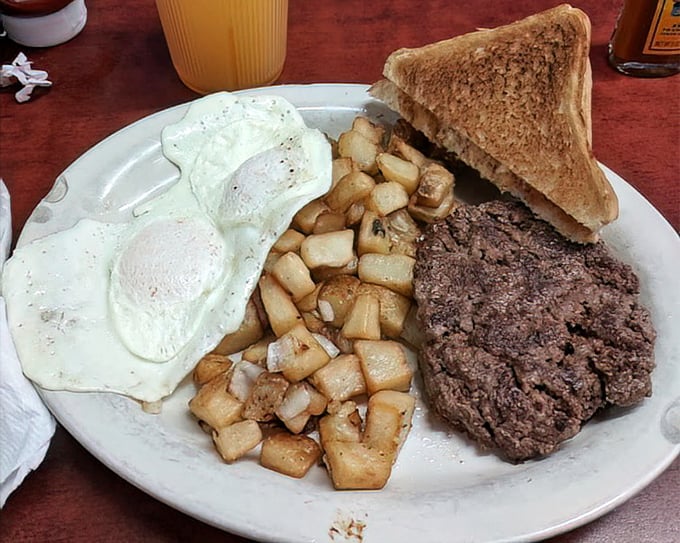 Hamburger steak with eggs and potatoes – the kind of breakfast that fueled generations of hard workers and still satisfies that deep-down, primal hunger.