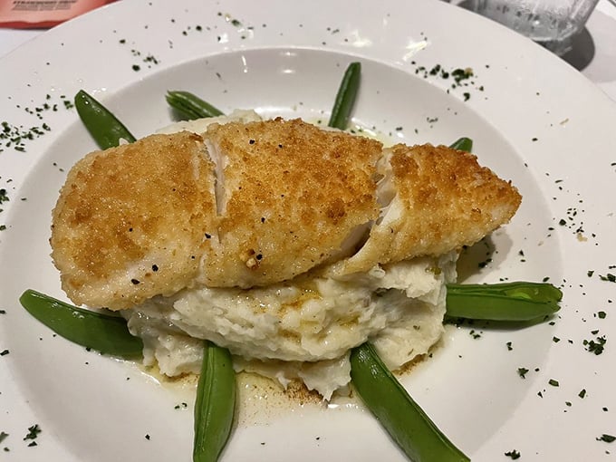 Hazelnut-crusted halibut perched on mashed potatoes—proof that sometimes the sea offers treasures as magnificent as the land.