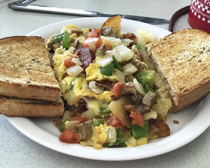 This scramble isn't just breakfast—it's a beautiful chaos of ingredients that somehow finds harmony on the plate, like a jazz improvisation you can eat.