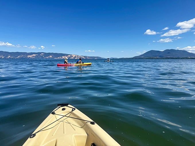 Kayaking Clear Lake offers the perfect social distancing – close enough to wave to fellow paddlers, far enough to claim your own slice of blue heaven.