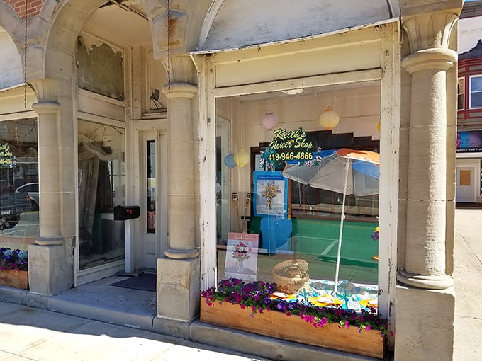 Keith's Flower Shop window display proves small-town storefronts still understand the art of visual invitation in an age of online shopping and digital distractions.