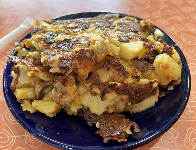 Lyonnaise potatoes with the perfect crisp-to-tender ratio. Humble spuds transformed into something worth crossing town for at 7am.