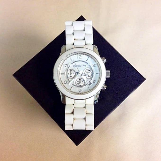 Time doesn't just tell money—it saves it too. This pristine Michael Kors watch proves luxury can be affordable when you shop smart.