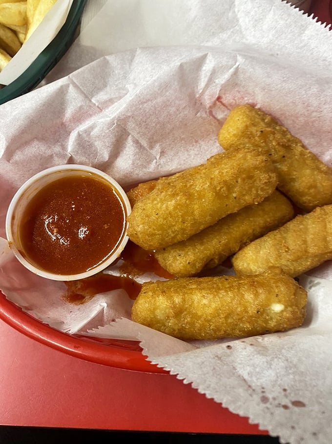Mozzarella sticks with marinara – golden-brown on the outside, stretchy cheese paradise within, the appetizer that's never gone out of style for good reason.