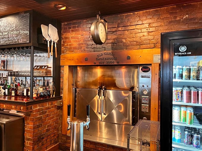 Behind the scenes magic – the smoker that transforms ordinary cuts into extraordinary meals through time, temperature, and a touch of alchemy.