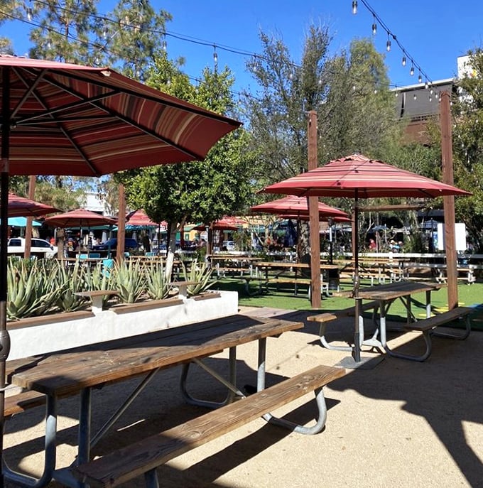 The outdoor patio offers desert dining perfection—shaded tables where you can enjoy your barbecue feast under Arizona's famously blue skies.