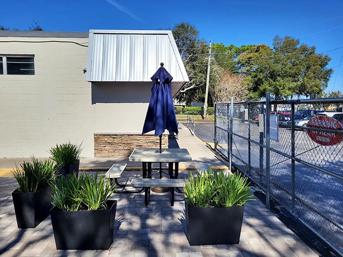 A peaceful outdoor nook for when the thrill of thrifting requires a moment of contemplation—or to text a friend about that amazing find inside.