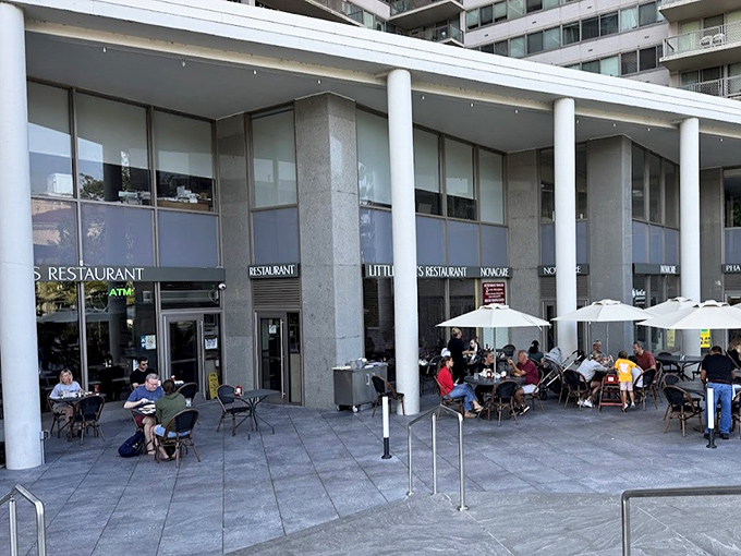 Philadelphia's architectural contrasts create the perfect backdrop for Little Pete's outdoor dining—modern meets timeless, just like their menu.