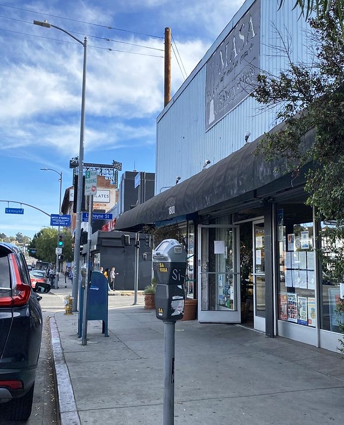 From this angle, Masa looks like any other storefront. But those who know, know—pizza paradise awaits just steps away.