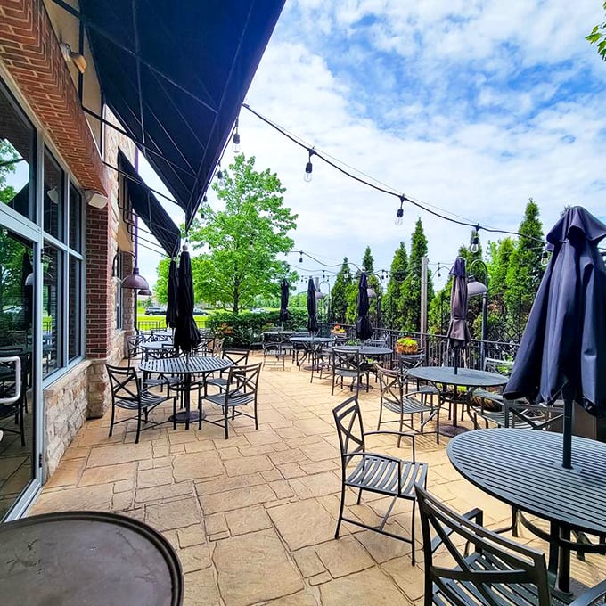 Summer evenings on Vittoria's patio—where string lights twinkle, wine flows, and nobody's in a hurry to go anywhere else.
