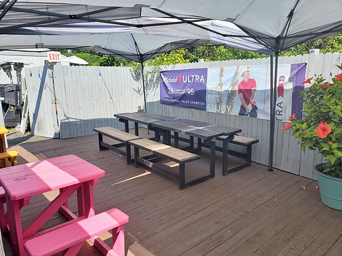 The covered outdoor seating area stands ready for crab-cracking action, rain or shine—seafood waits for no weather.