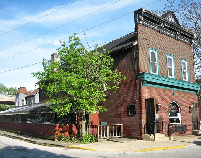 A glimpse of Maple Tree Inn's original location—the brick building that first introduced Homewood to the flavors of Louisiana.