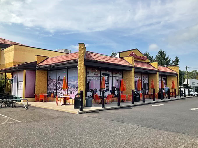 The Mediterranean-inspired exterior with its terra cotta roof tiles and outdoor dining area. Like finding a slice of Italian village life in a Pennsylvania parking lot.