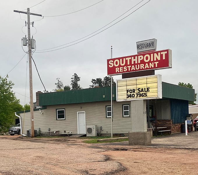 Even with a "For Sale" sign, this Stevens Point landmark stands proud—a testament to decades of serving comfort on a plate.