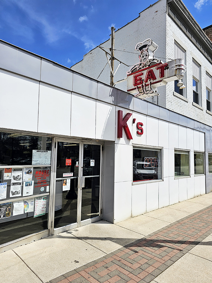 The vintage "EAT" sign above K's isn't just an instruction—it's the best advice you'll get all day. This Troy landmark promises satisfaction without fanfare.