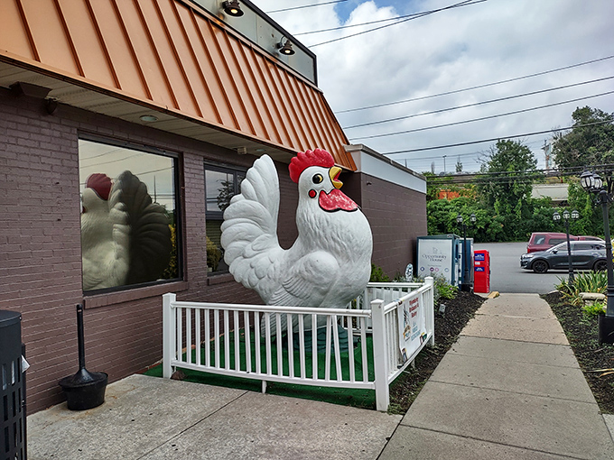 That chicken statue isn't just quirky decor—it's practically the town mascot. If buildings could have personalities, this one would give you a hug.