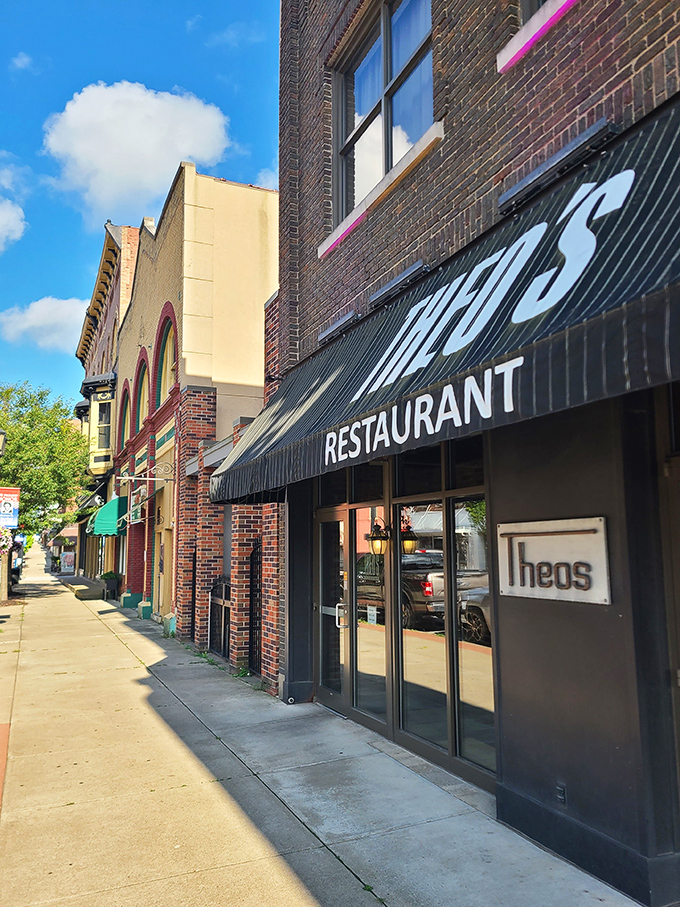 Downtown Cambridge's historic streetscape frames Theo's exterior – a reminder that some of life's greatest pleasures hide behind the most modest facades.