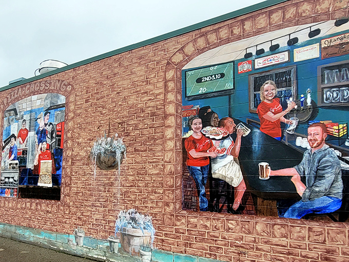 The exterior mural celebrates what happens inside—strangers becoming friends over the universal language of exceptional pizza.