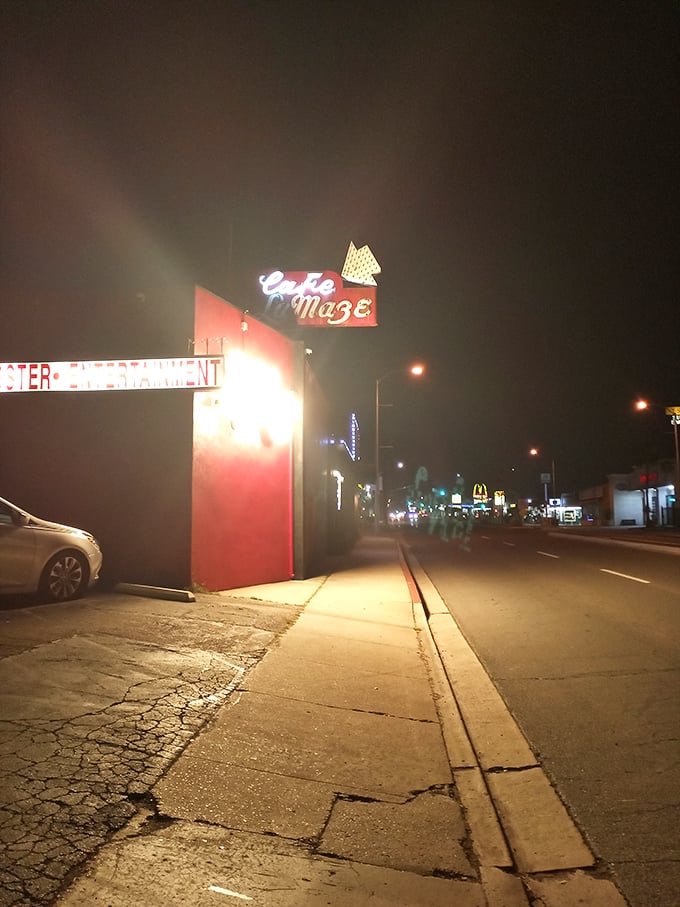 That neon sign isn't just illuminating the night—it's a beacon guiding hungry souls to prime rib paradise since the days of tail fins.